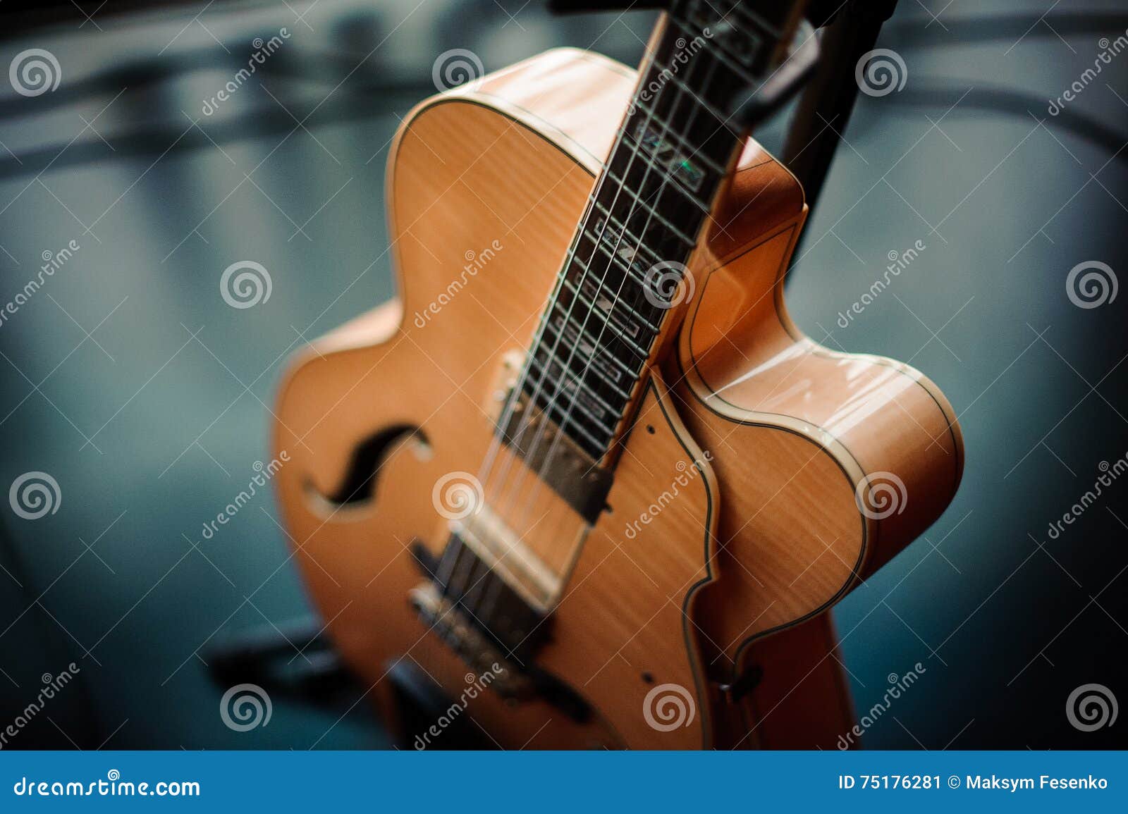 Six-string Acoustic Guitar on a Stand Stock Image - Image of concert ...