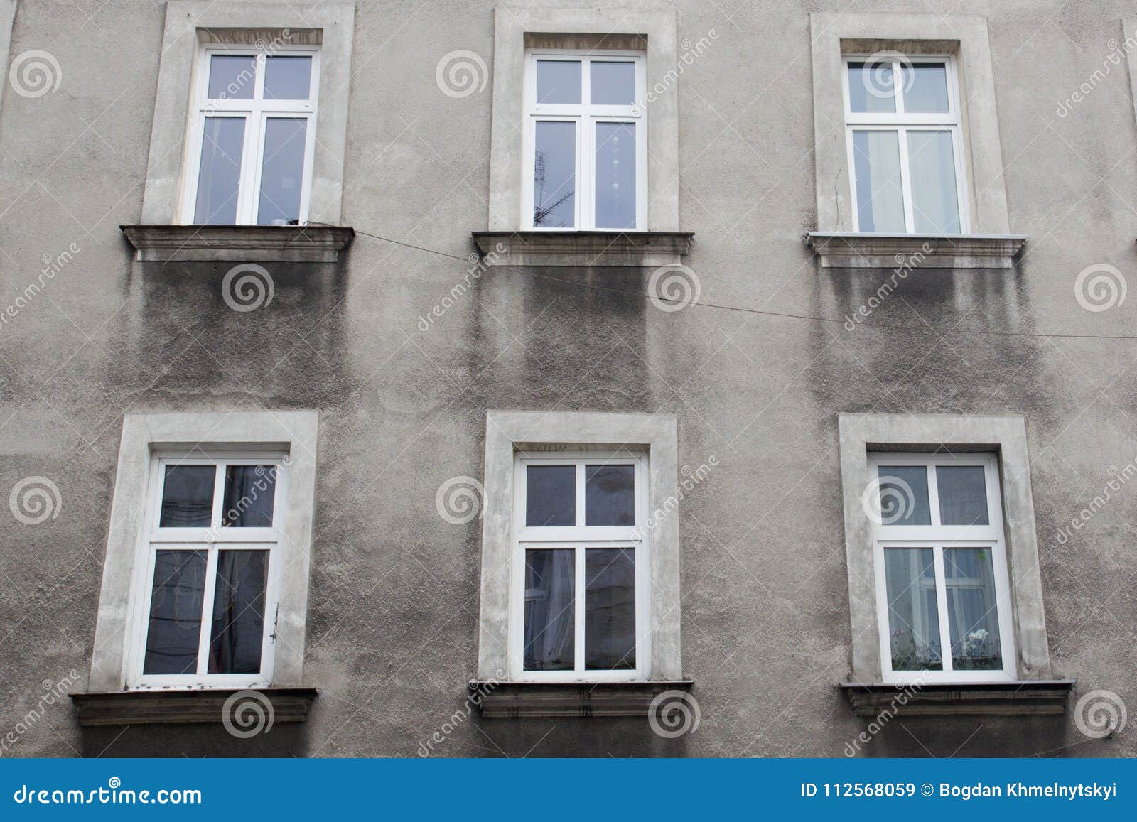 Six Windows on the Facade of the Gray House Stock Image - Image of ...