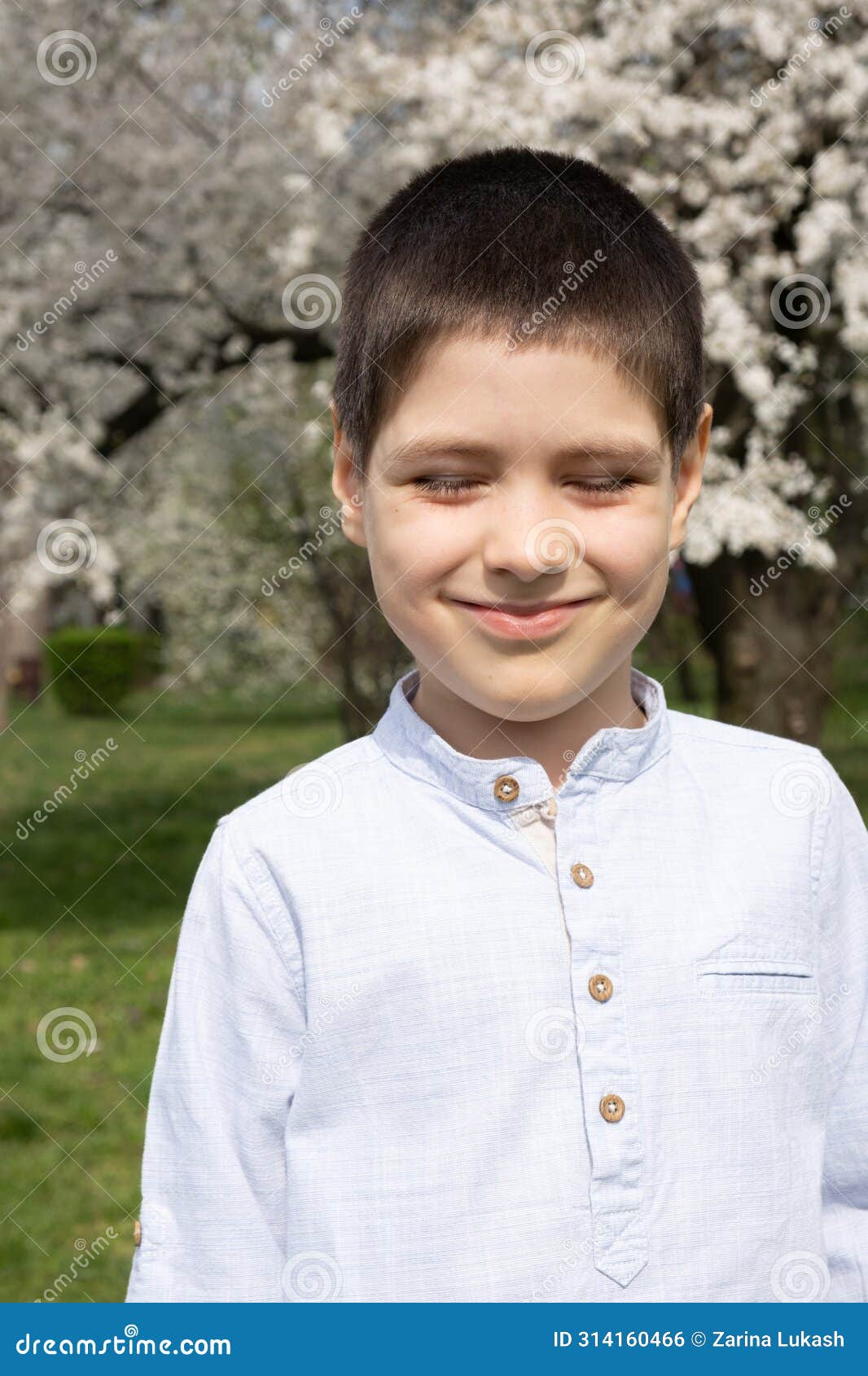 Six-year-old Boy Squinting in Bright Afternoon Sun. Stock Photo - Image ...
