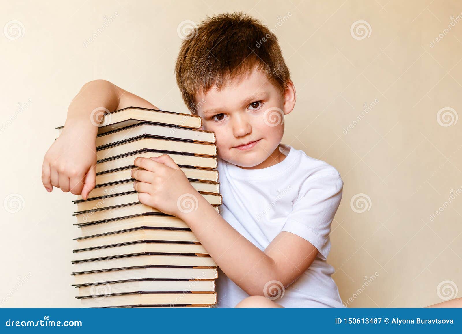 A Six-year-old Child Hugs a Large Stack of Books Stock Image - Image of ...