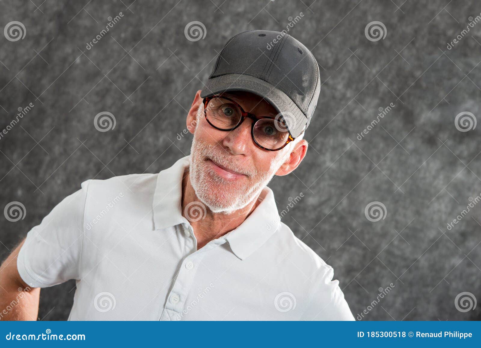 Sixty Year Old Man Wearing a Baseball Cap Stock Photo - Image of posing ...