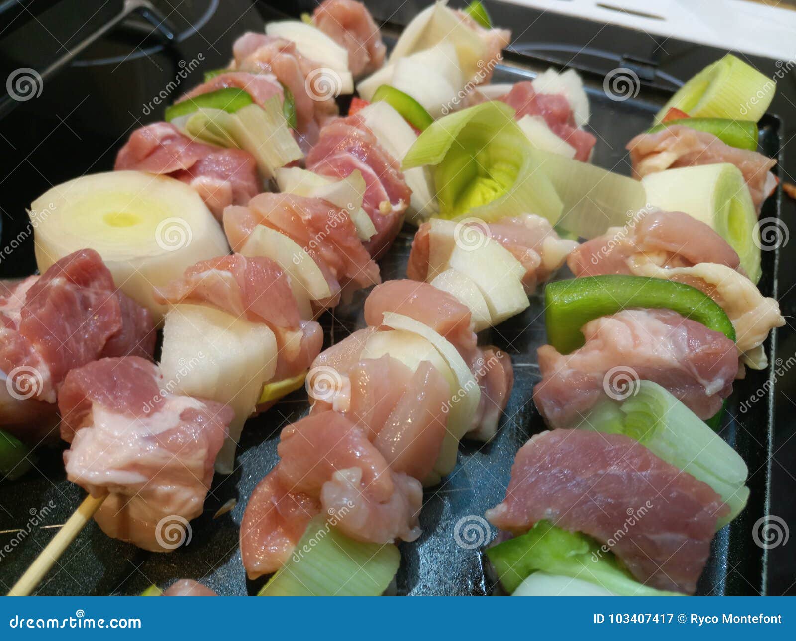 Pork skewers frying stock image. Image of sizzling, skewers - 103407417