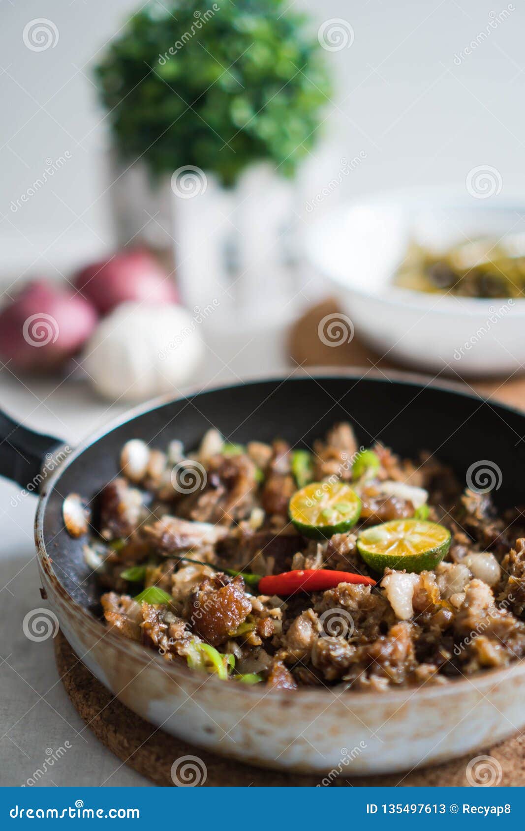 Sizzling Pork Sisig with Raw Egg Stock Image - Image of cook, oriental ...