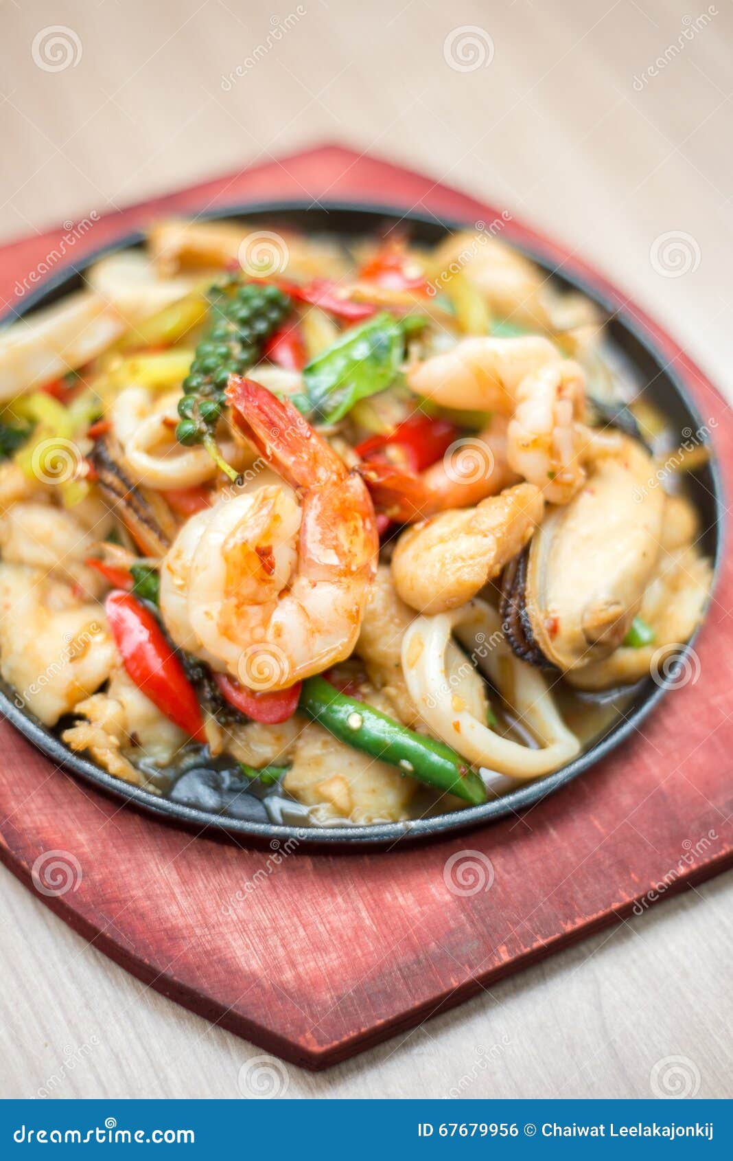 Spicy And Sizzling Pork Sisig Is A Favorite For Filipinos Close-up In A ...