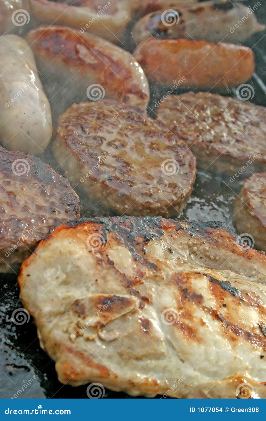 Sizzling Smokey Barbecue stock photo. Image of cook, barbeque - 1077054