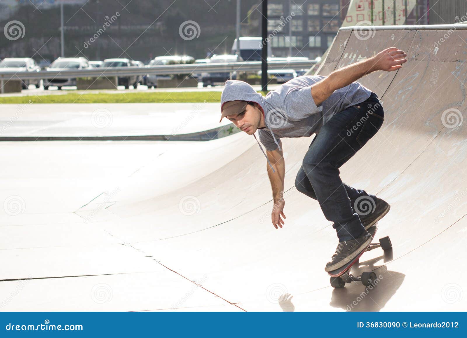 Skateboarder in Action in the Skate Park. Stock Photo - Image of ...