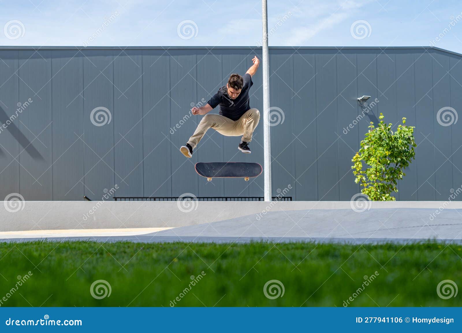 Skateboarder Doing a Flip Trick Stock Photo - Image of city, skateboard ...