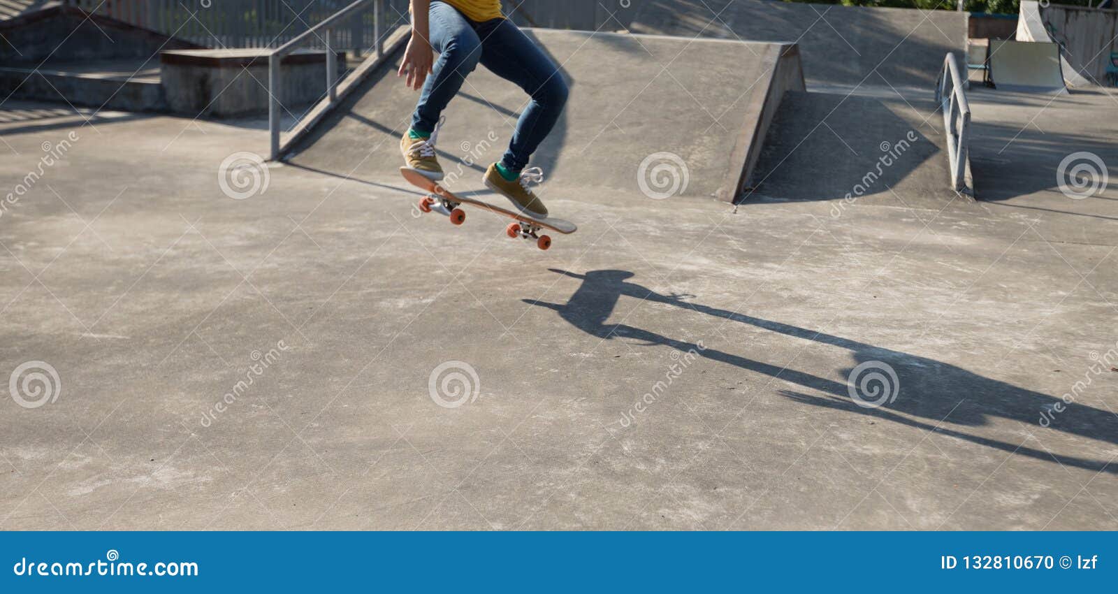 Skateboarder doing ollie stock photo. Image of person - 132810670