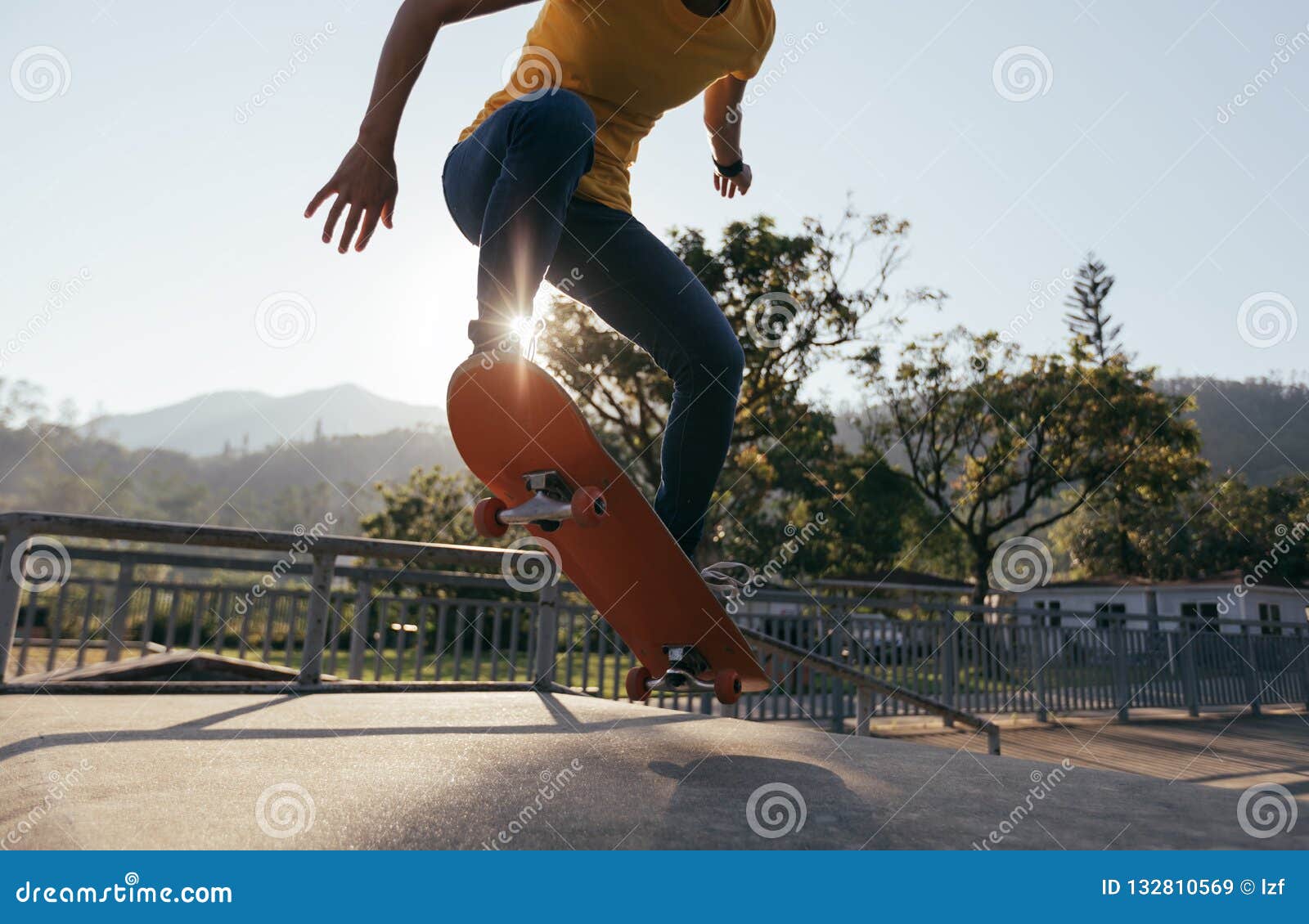 Skateboarder doing ollie stock image. Image of female - 132810569