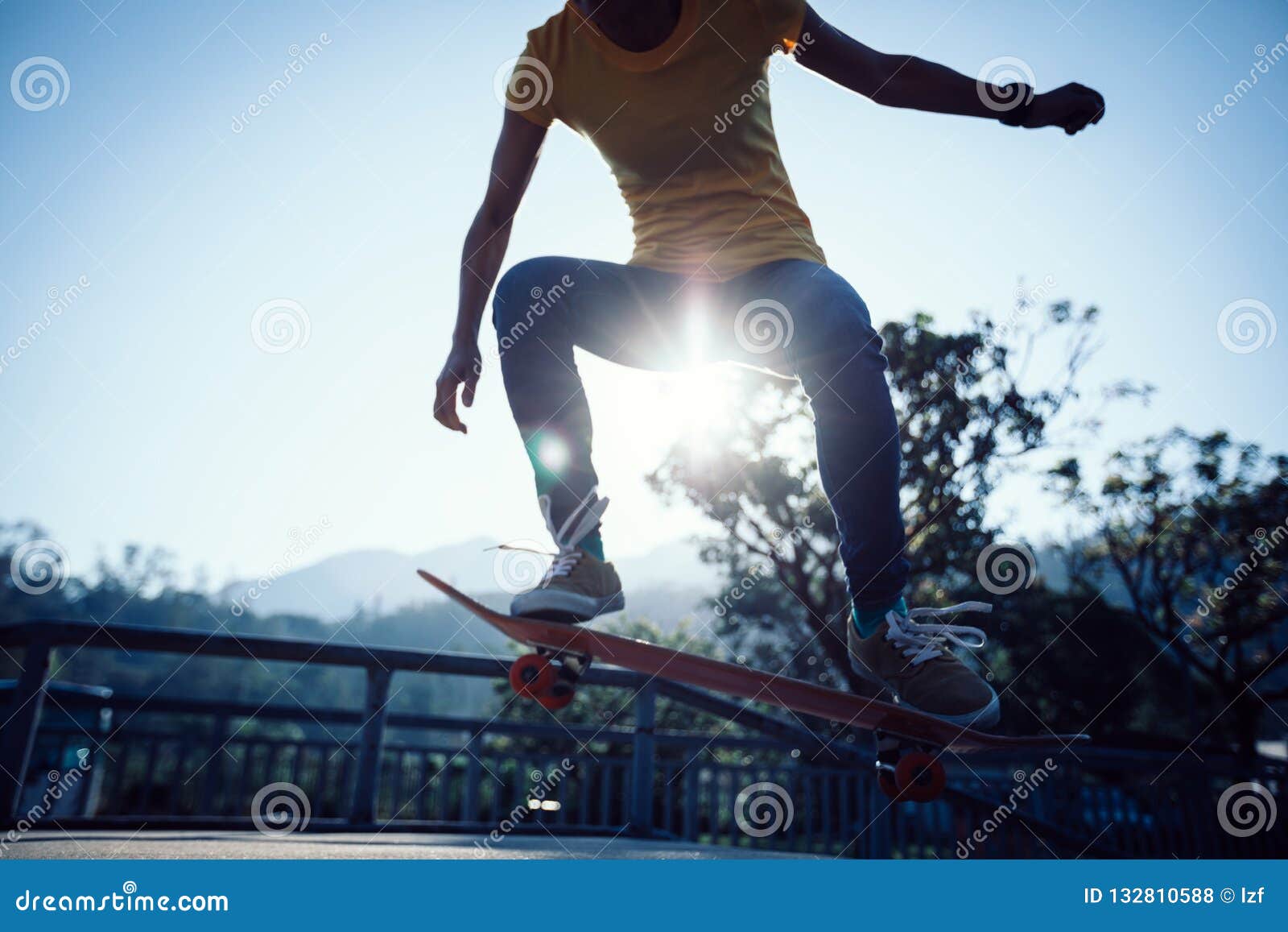 Skateboarder doing ollie stock photo. Image of black - 132810588