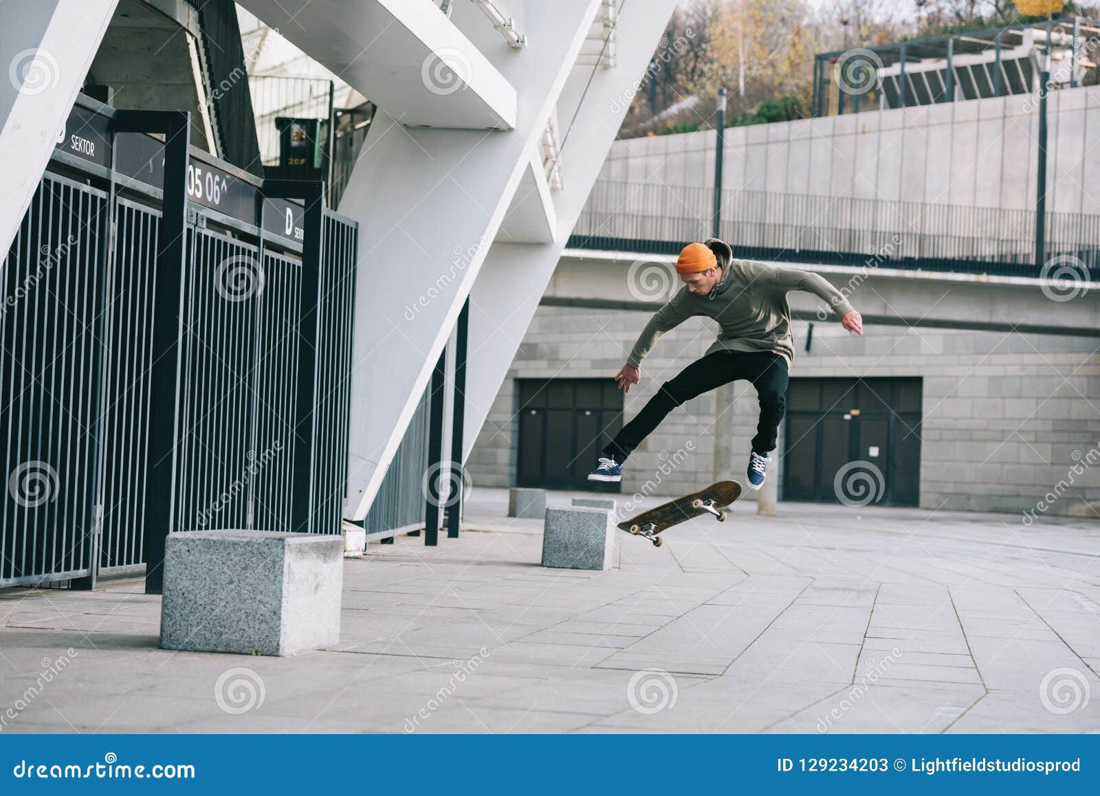 Skateboarder Performing Jump Trick Stock Image - Image of skater ...