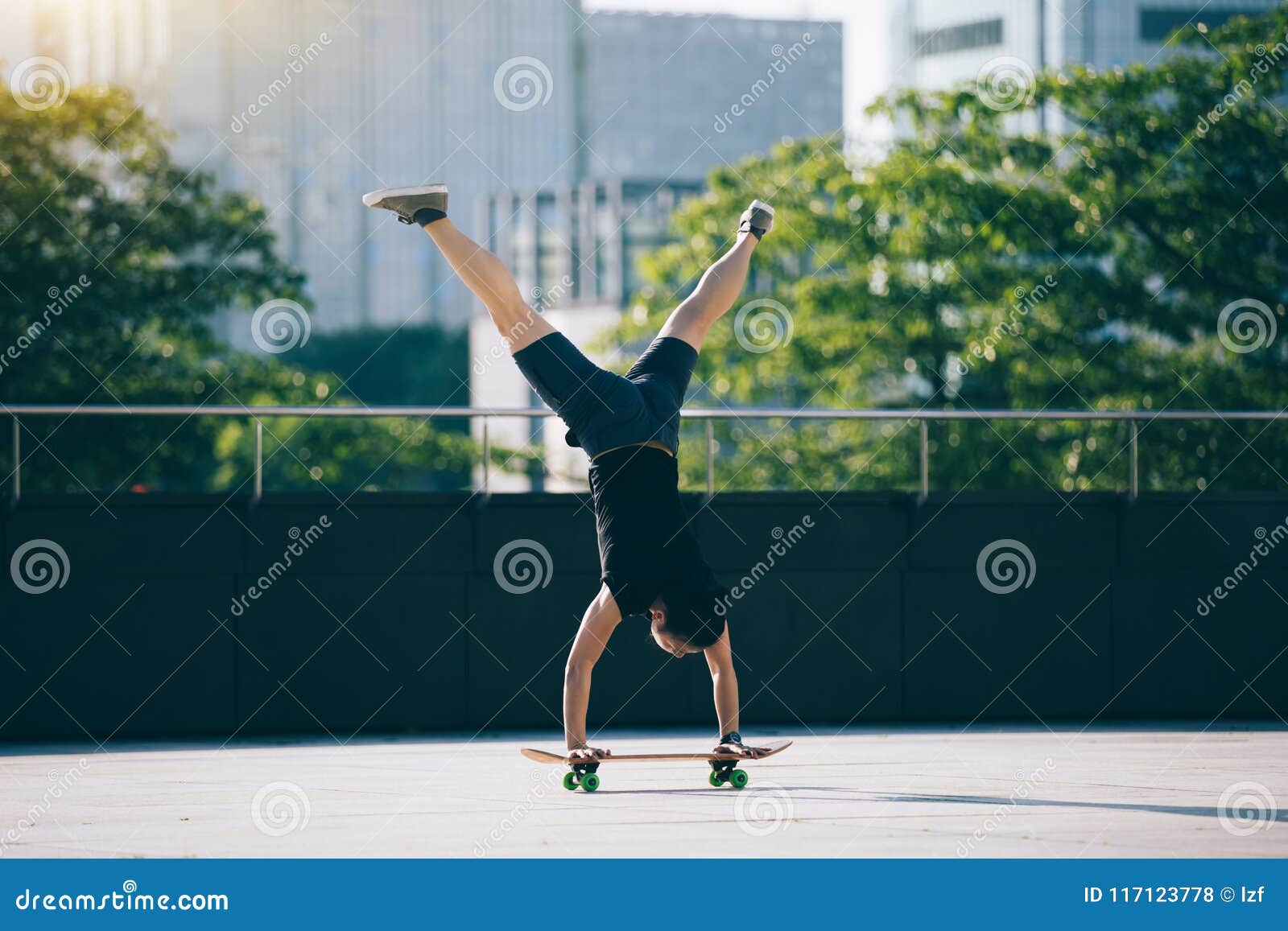 Skateboarder Practice Handstand on Skateboad Stock Photo - Image of ...