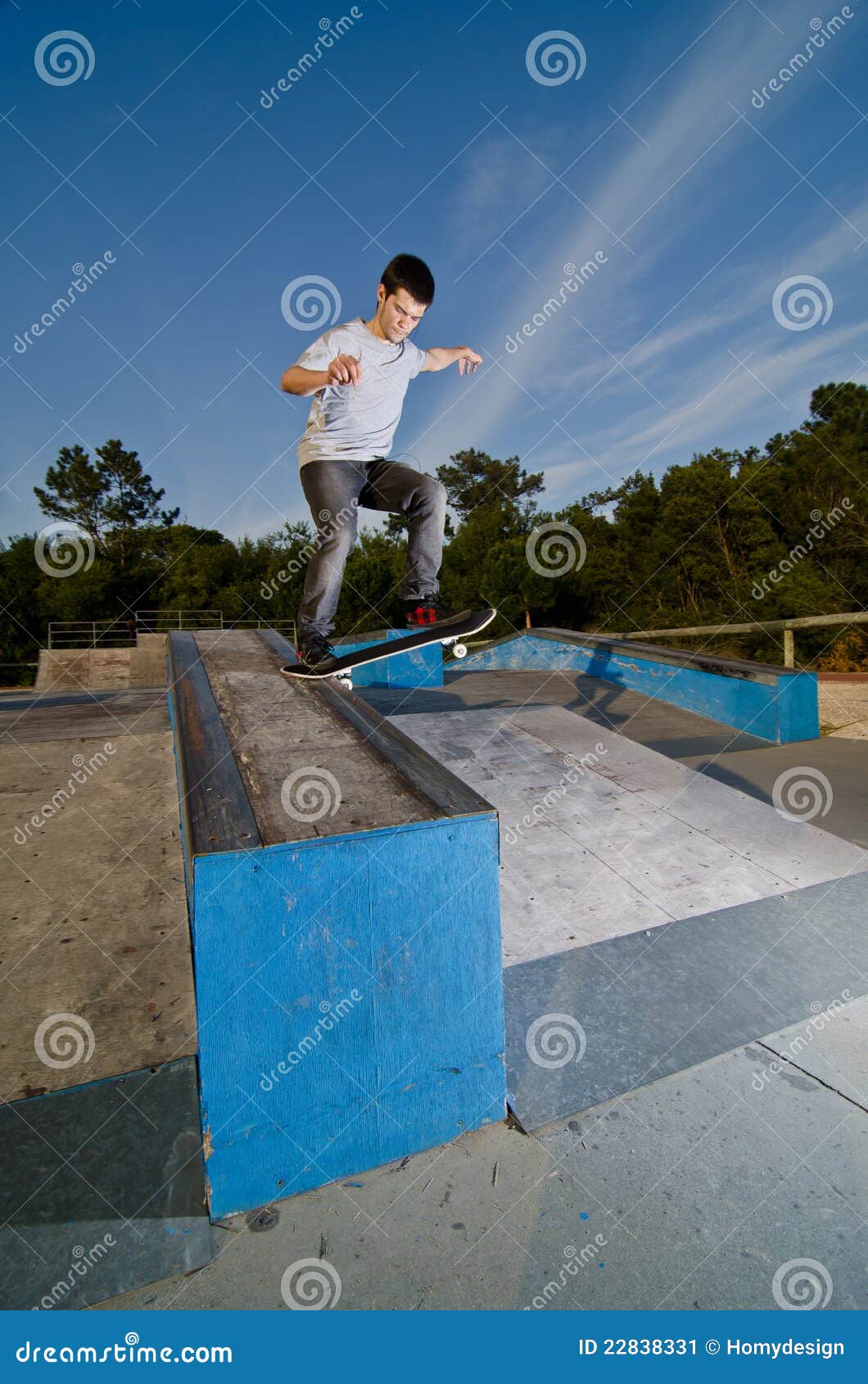 Skateboarder on a slide stock image. Image of skatepark - 22838331