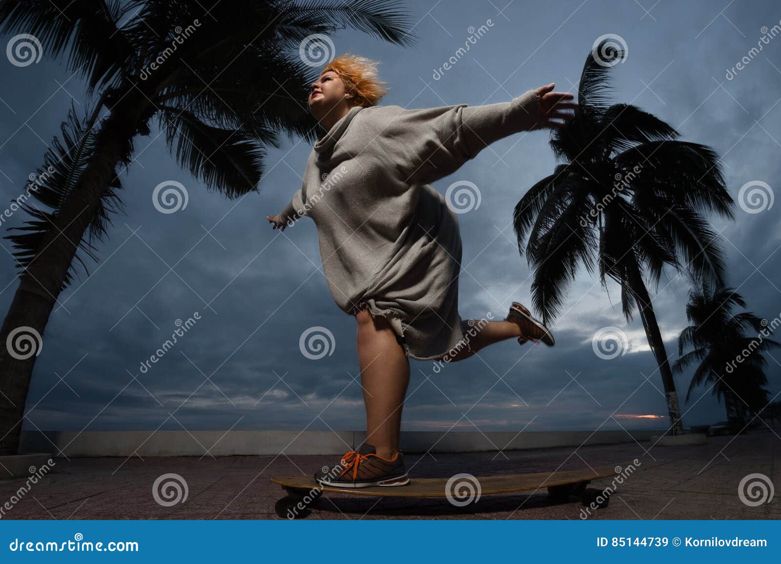 Skateboarding woman stock image. Image of overweight - 85144739