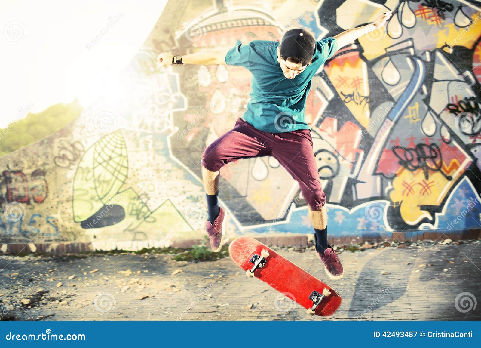 Skater in Movement Making a Trick with His Skate at Sunset Stock Image ...