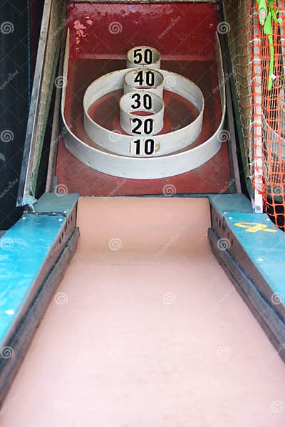 Skeeball Carnival Arcade Game Stock Photo - Image of skeeball, cylinder ...