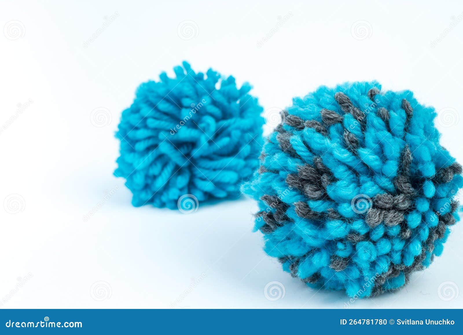 Skein of Blue Threads for Knitting on a White Background. Pompon Stock ...
