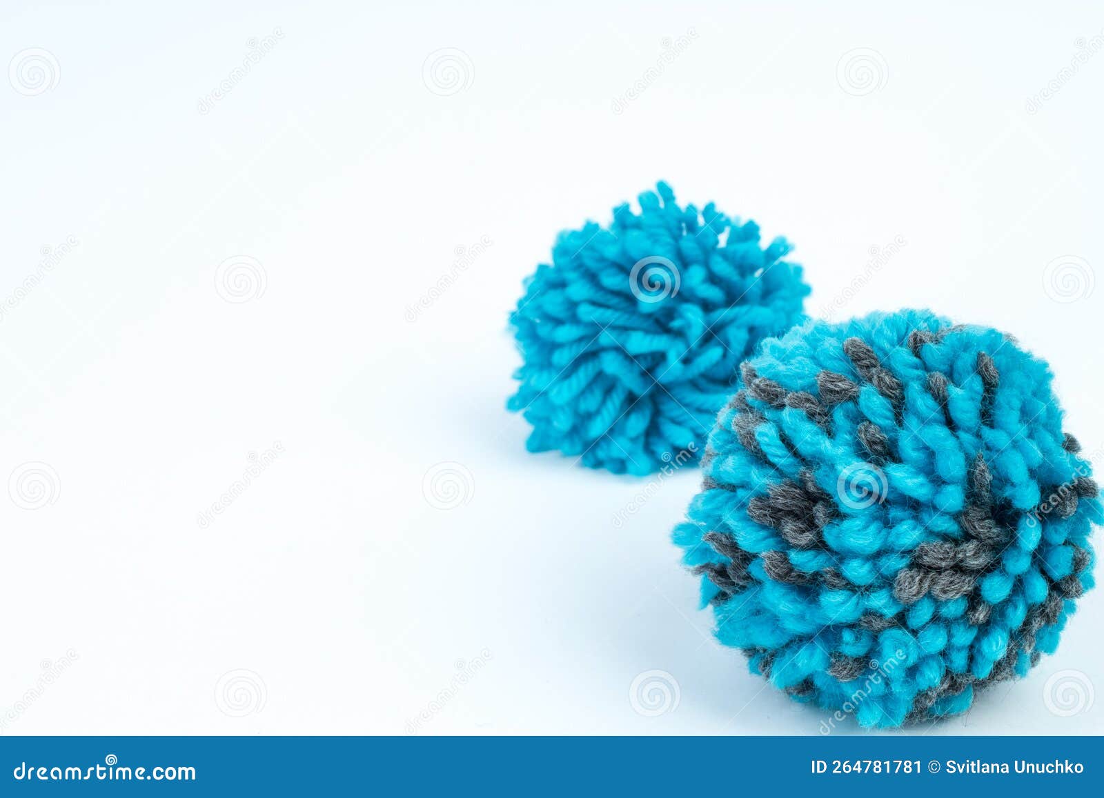 Skein of Blue Threads for Knitting on a White Background. Pompon Stock ...