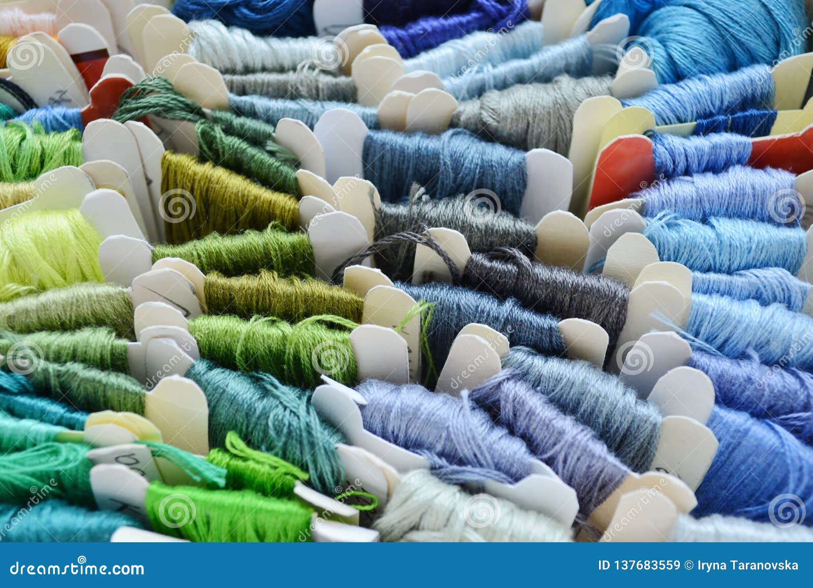 Skeins of Colorful Threads in Cold Colors for Embroidery and Sewing ... Skeins of Colorful Threads in Cold Colors for Embroidery and Sewing ...
