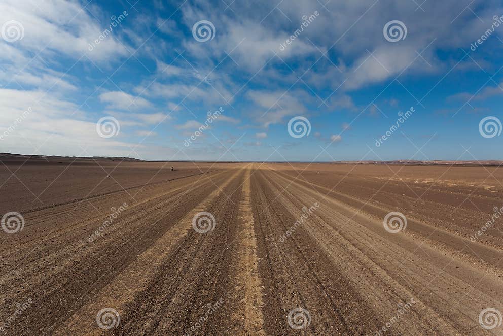 Skeleon coast road stock image. Image of road, clouds - 53261861