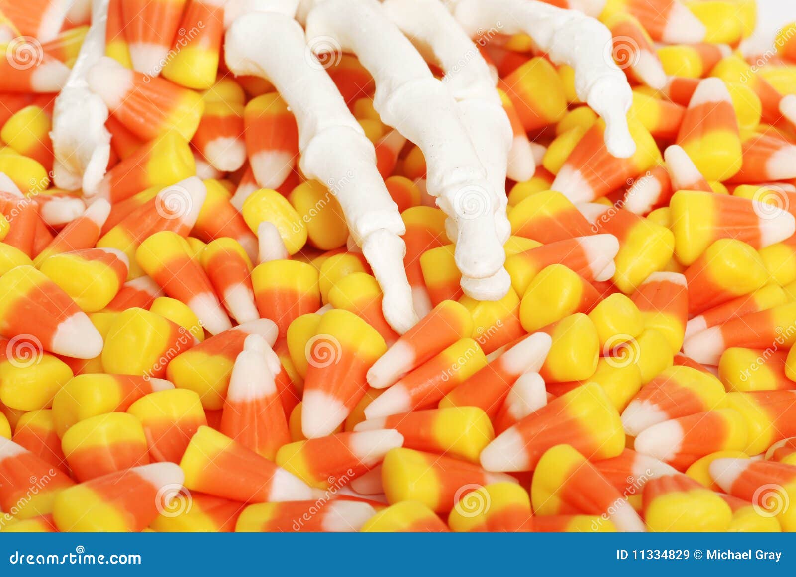 Skeleton Hand and Halloween Candy Stock Image - Image of junk, abstract ...