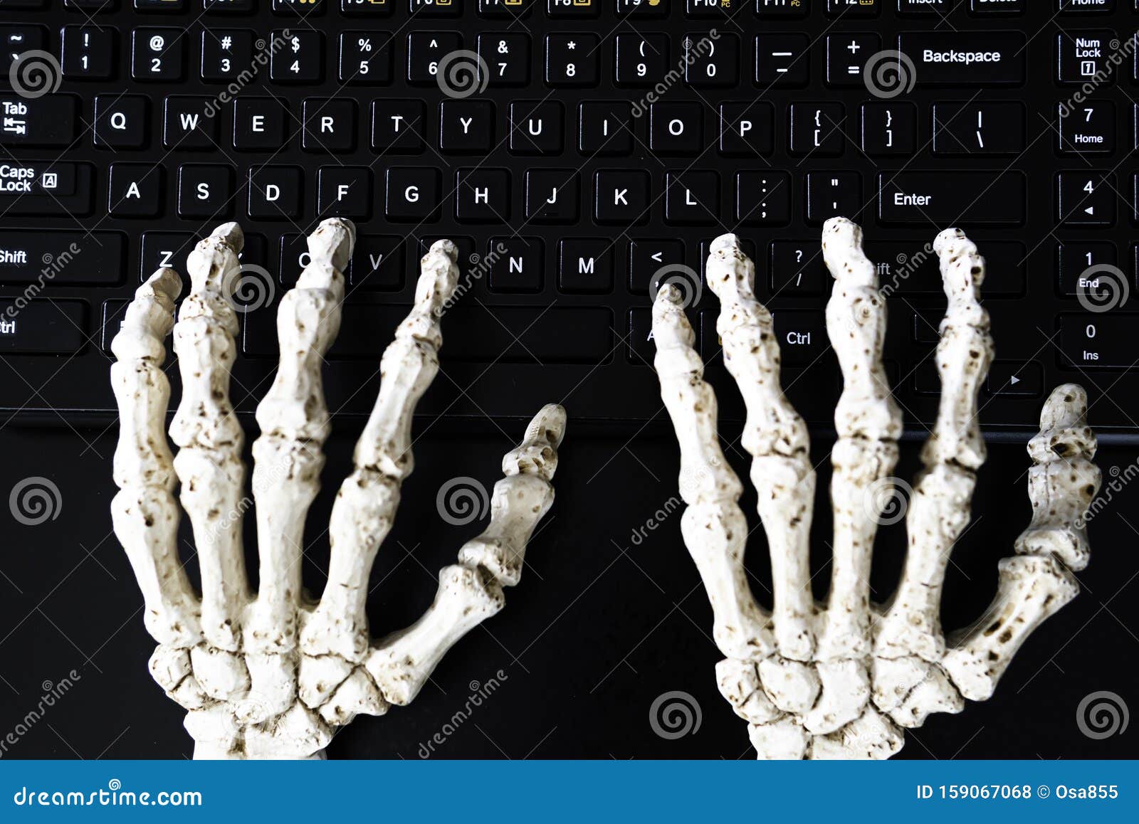 Skeleton Hands Working on Computer for Halloween Stock Photo - Image of ...