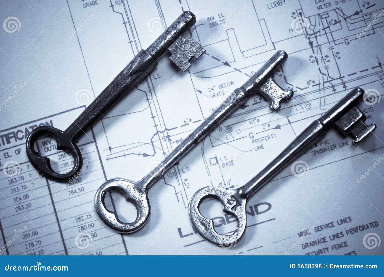Skeleton Keys Against Blueprints Stock Photo - Image of renovation ...