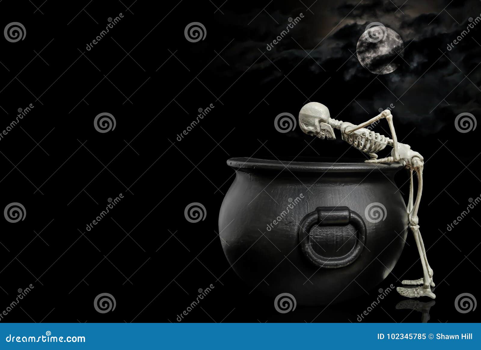 Skeleton Peaking in Cauldron Stock Image - Image of leaning, covered ...