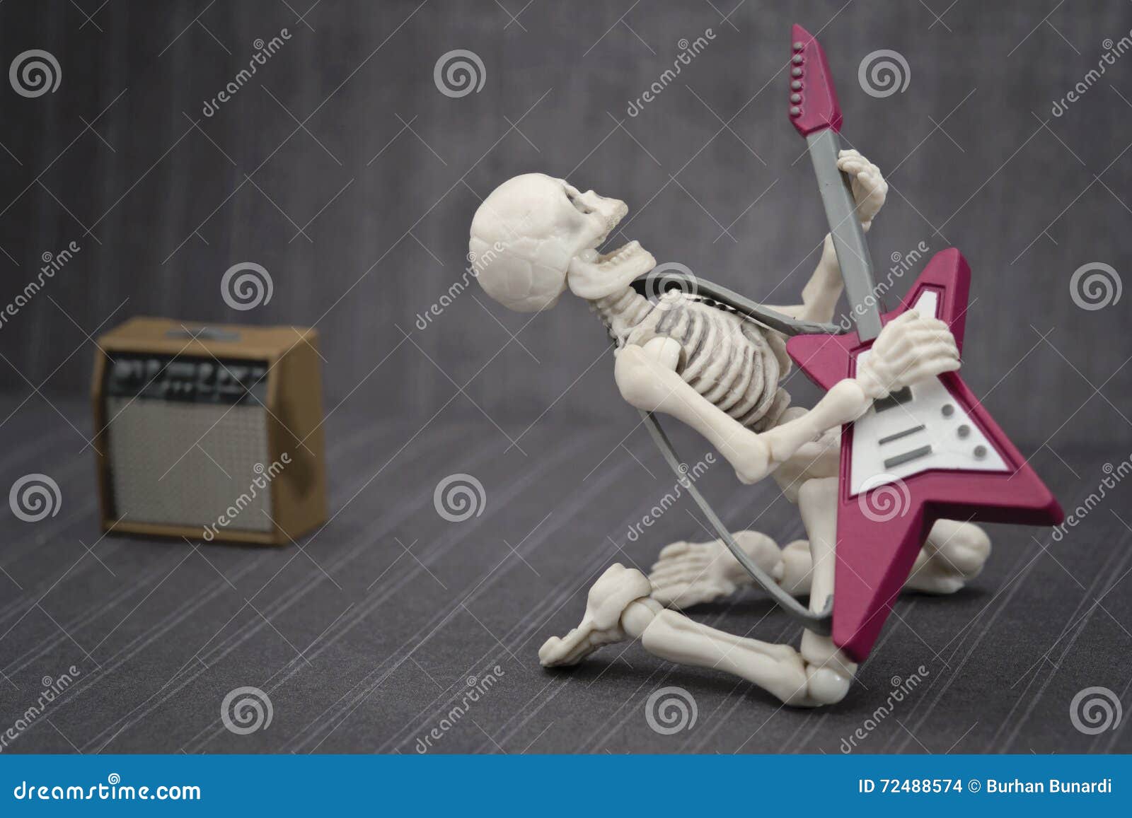 Skeleton rocks stock photo. Image of finger, concert - 72488574