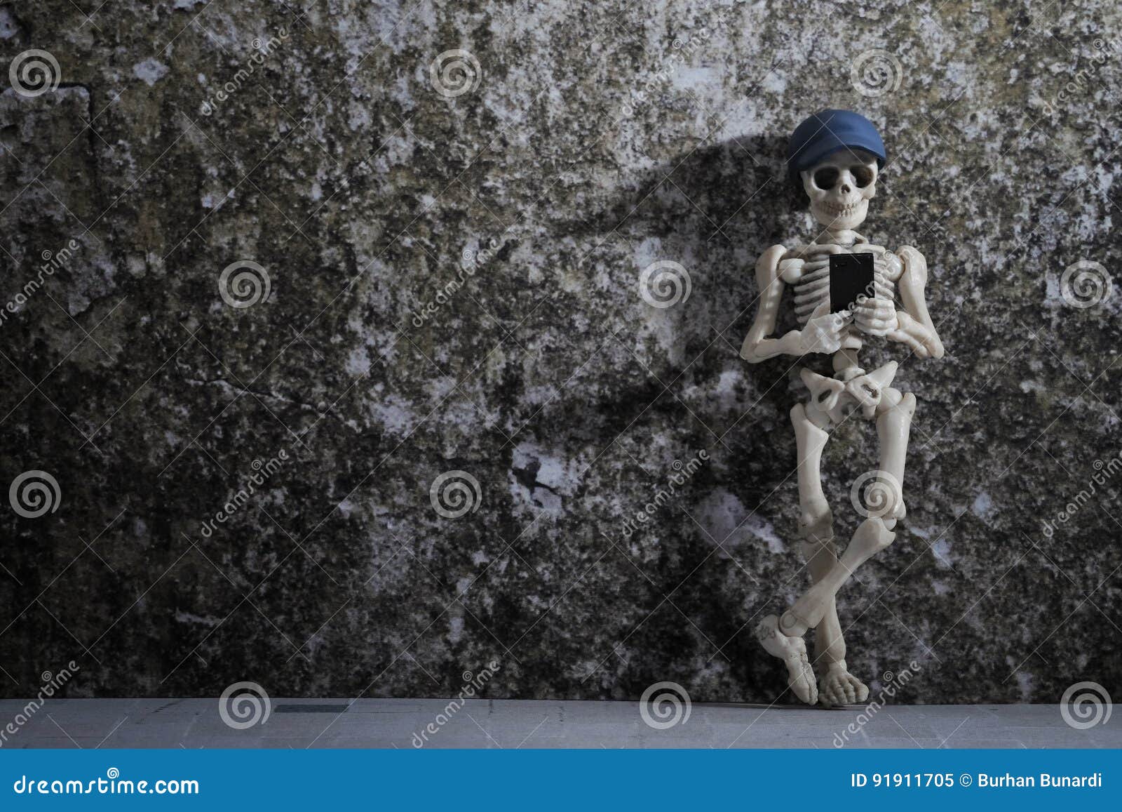 Skeleton and smartphone stock image. Image of phone, design - 91911705