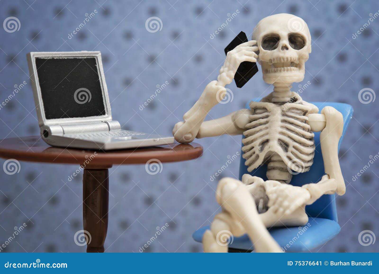 Skeleton works stock image. Image of smartphone, anatomy - 75376641