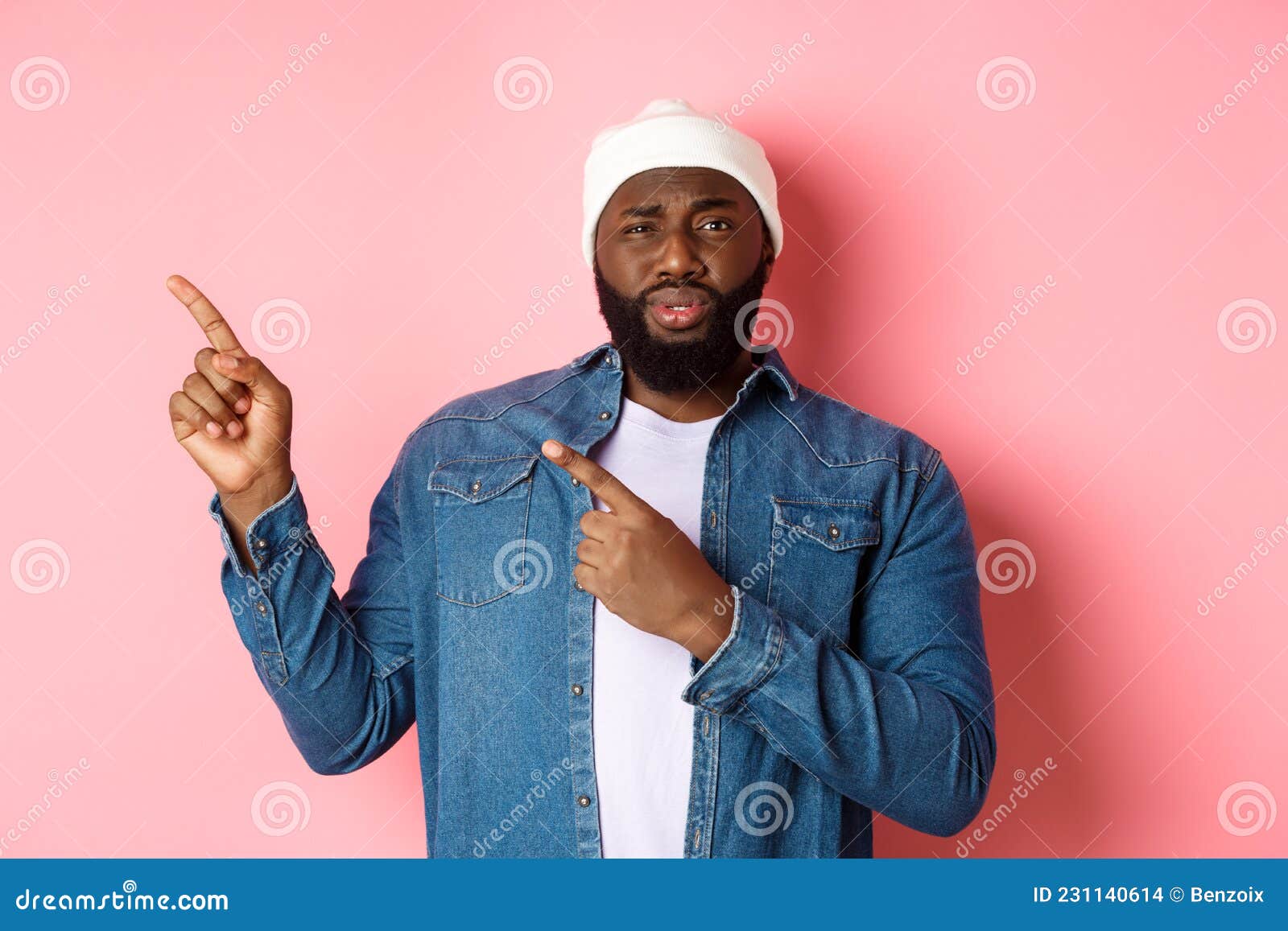 Skeptical and Doubtful Black Man Staring at Camera Unsure, Pointing ...