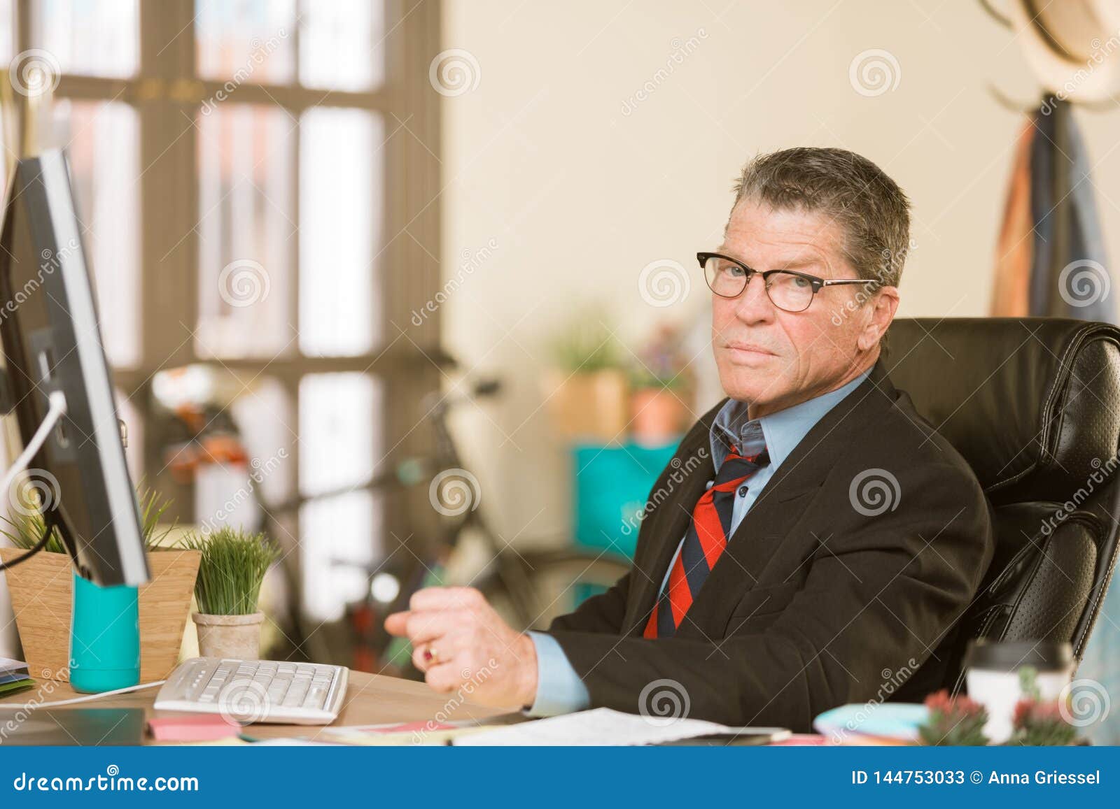 Skeptical Man at His Desk stock image. Image of negative - 144753033