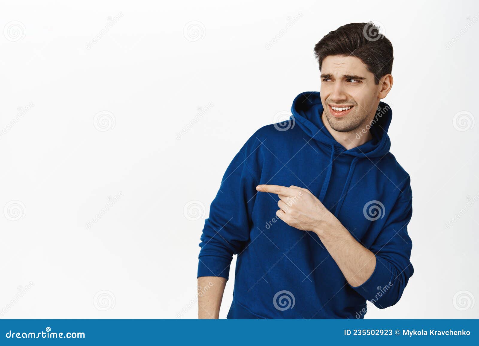 Skeptical And Unamused Bearded Guy, Pointing And Looking Left With ...