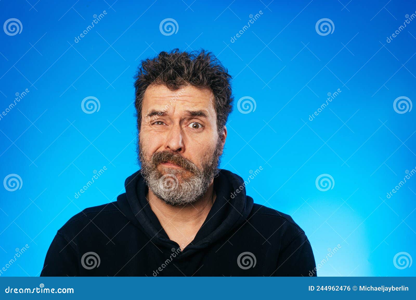 Skeptical Old Man Emotions Portraits on Blue Background Stock Photo ...