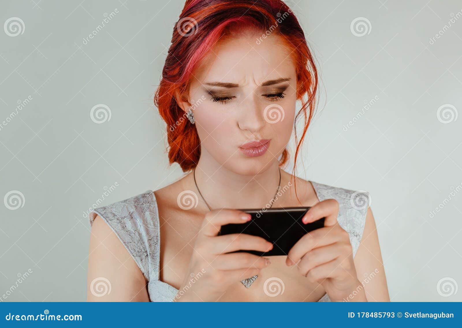 Skeptical Woman Texting in Studio Stock Image - Image of green, female ... Skeptical Woman Texting in Studio Stock Image - Image of green, female ...