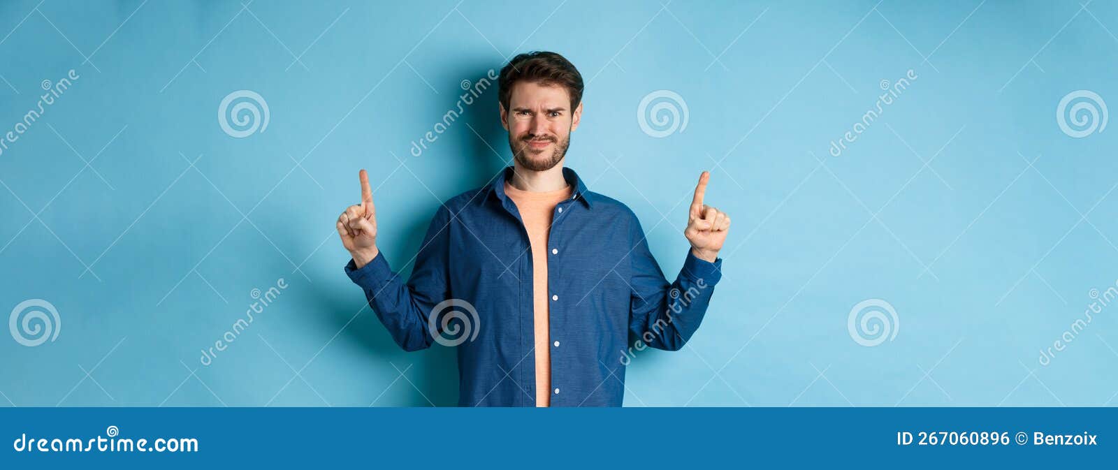 Skeptical Young Man Frowning and Squinting, Cringe from Something ...