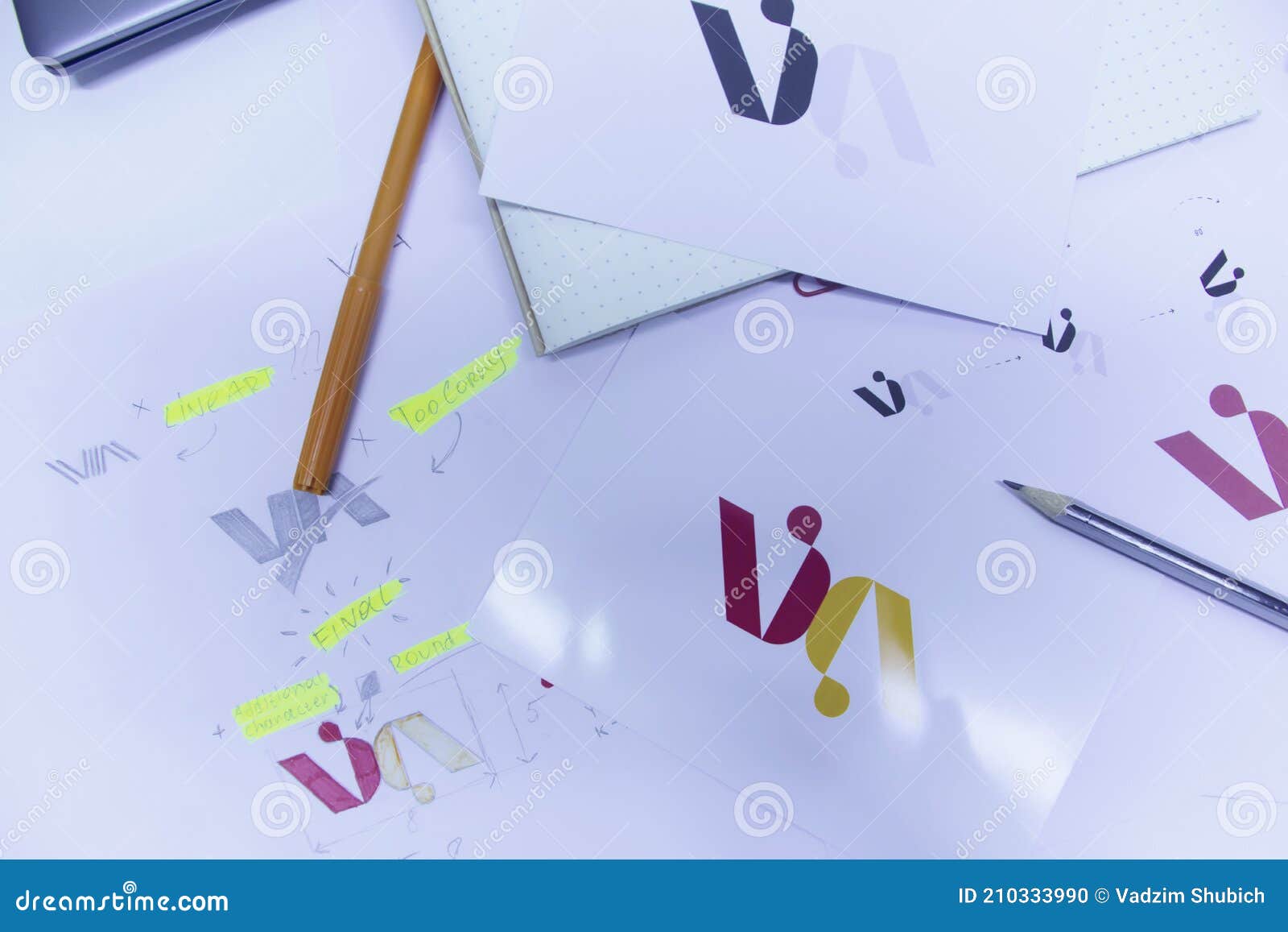 Sketches and Drawings of the Logo Printed on Paper. Development of Logo ...