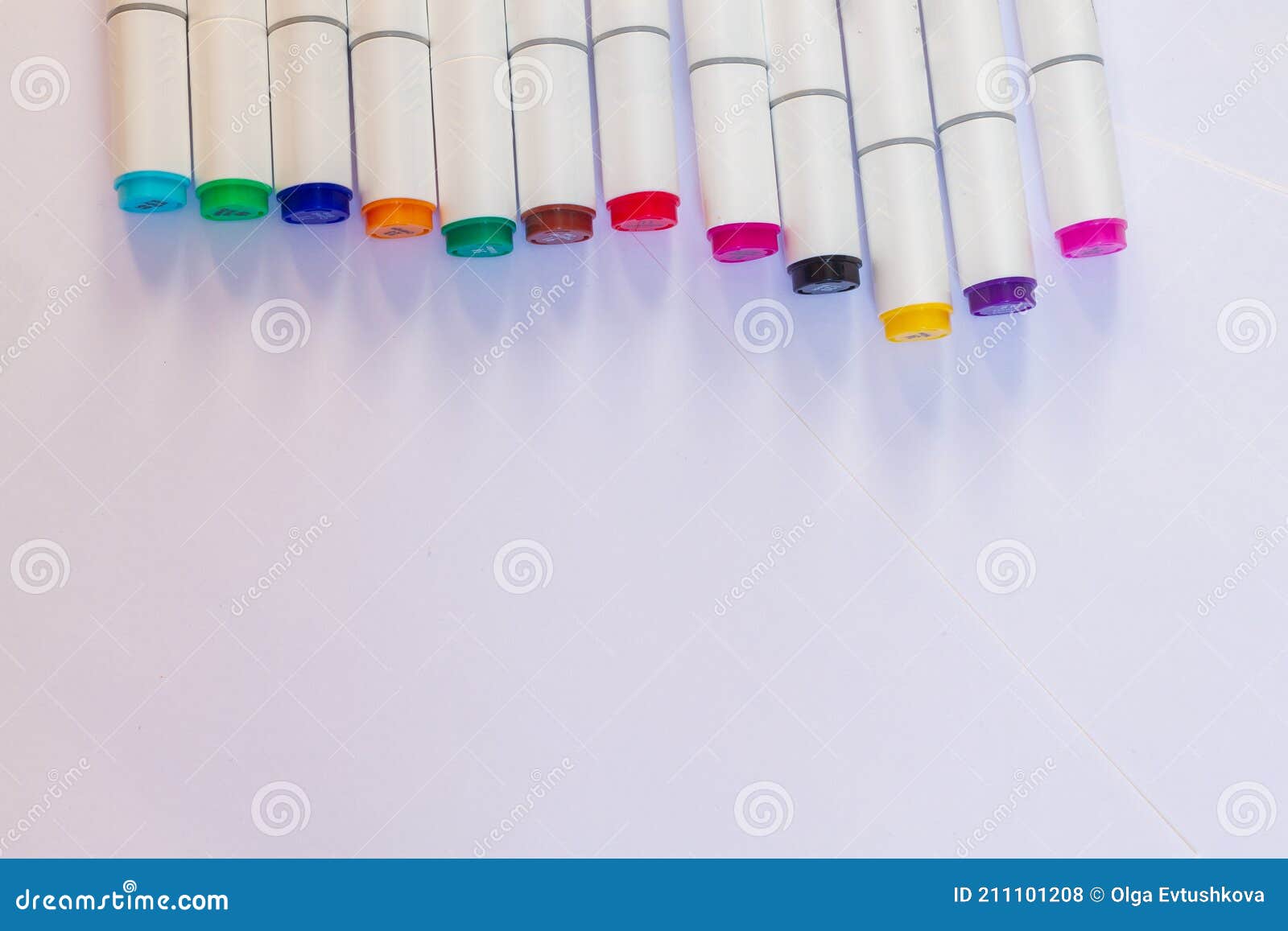 Sketching Markers in 12 Colors on a White Sheet of Paper Stock Photo ...