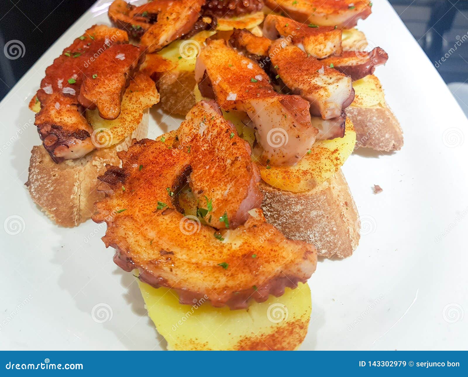 Skewer Octopus on a Piece of Bread in a Restaurant Bar Stock Image ...