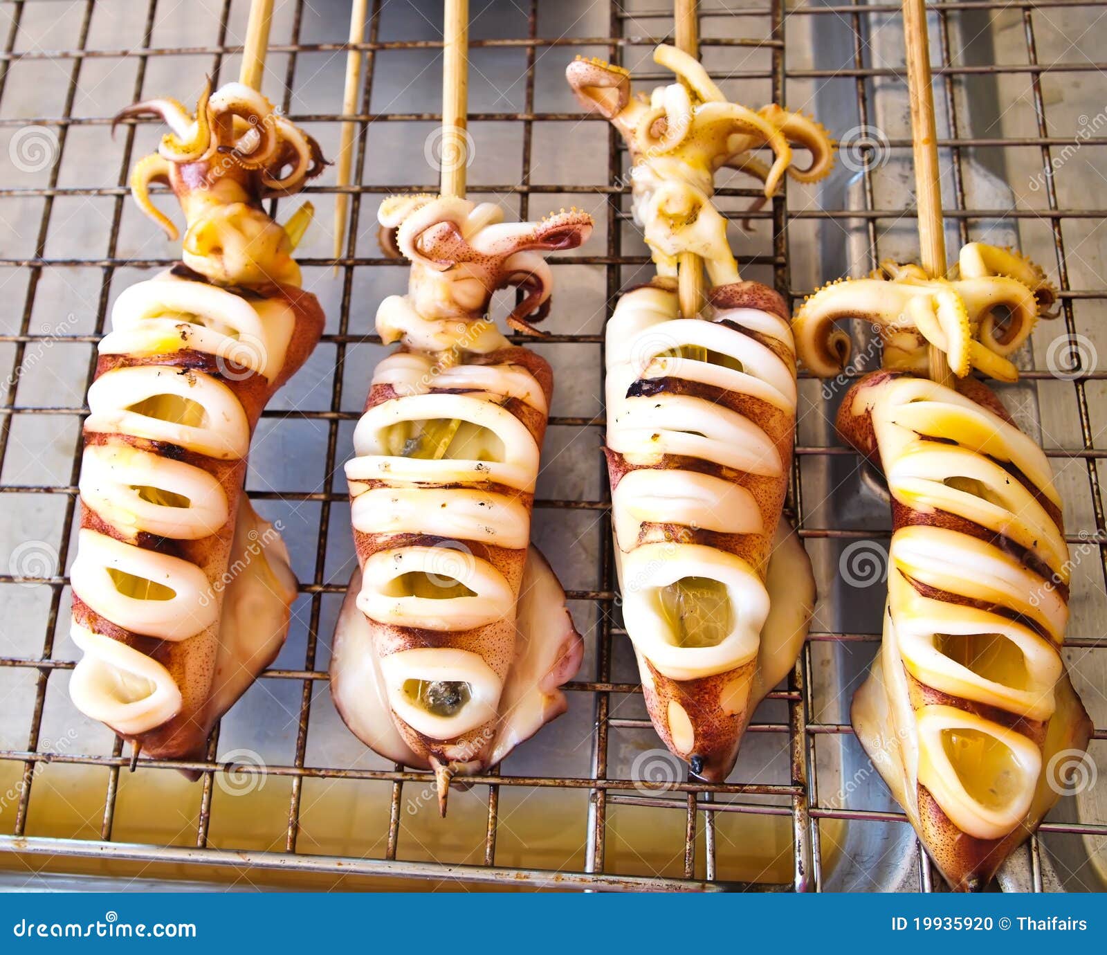 Skewered Squid on Wooden Sticks Grilled Tentacles Stock Photo - Image ...