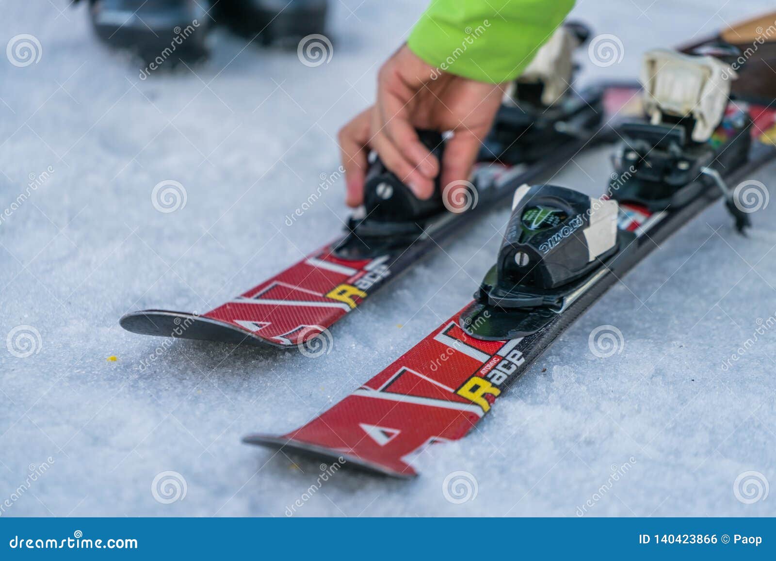Ski Instructor Adjusting the Boots Lock on Skis Editorial Photo - Image ...