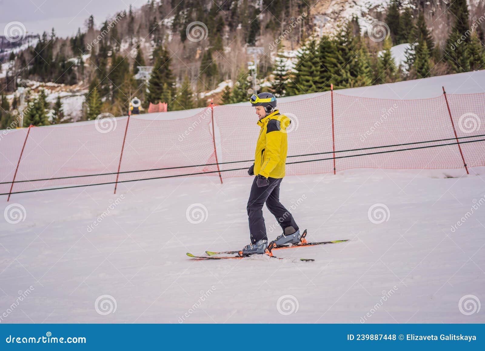 Ski Instructor at Training Track Showing Students How To Ski Stock ...