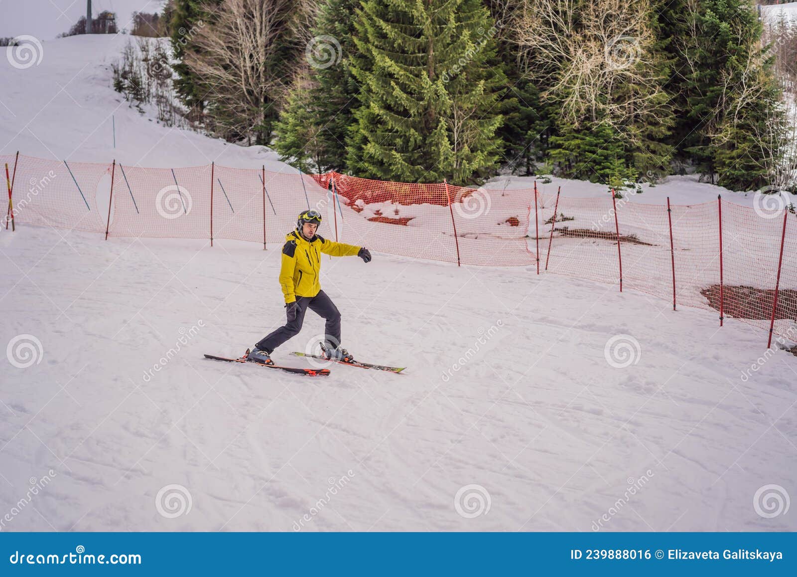 Ski Instructor at Training Track Showing Students How To Ski Stock ...