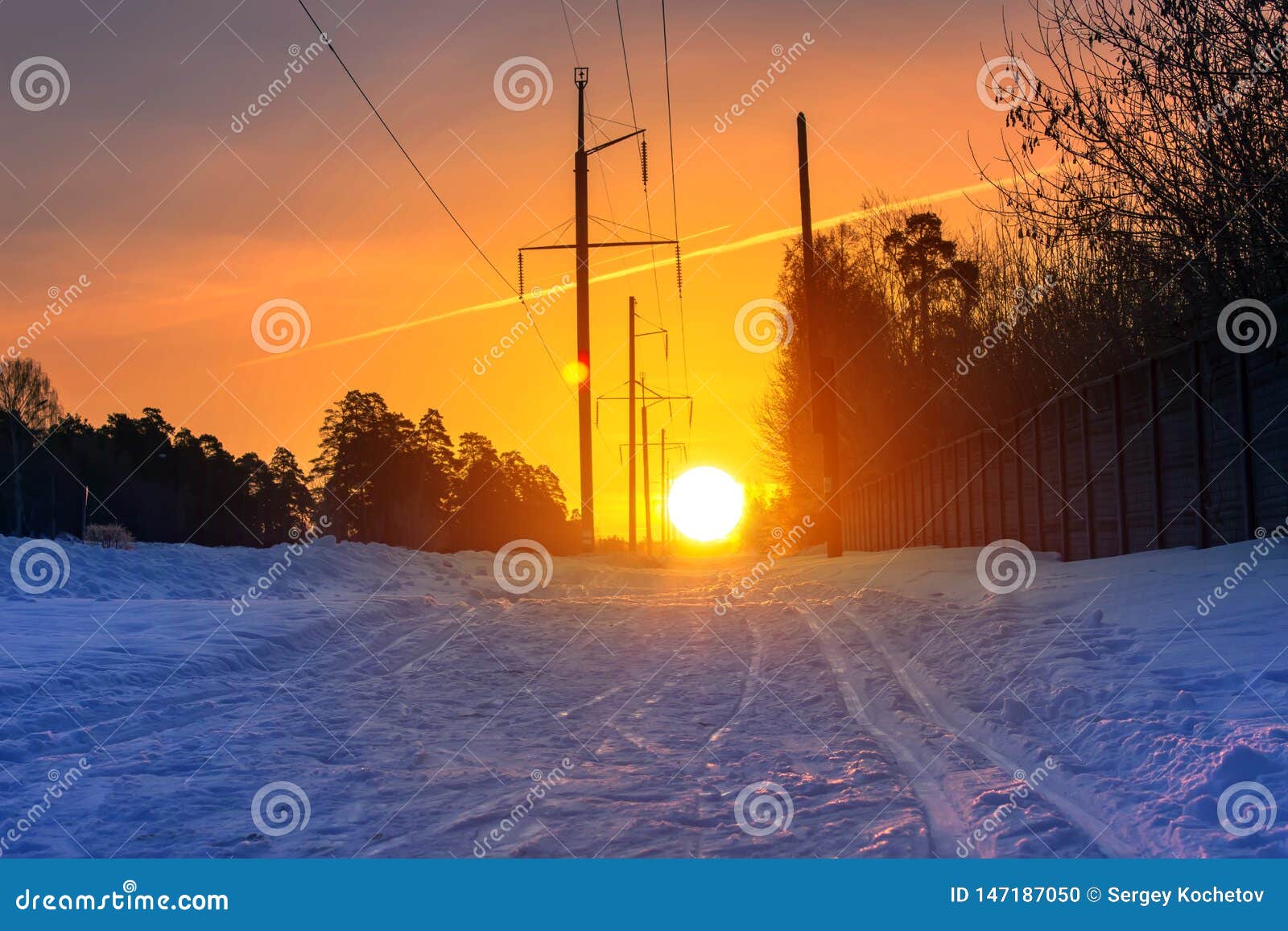 Ski Track on Snow Surface Against the Rising Sun Stock Photo - Image of ...