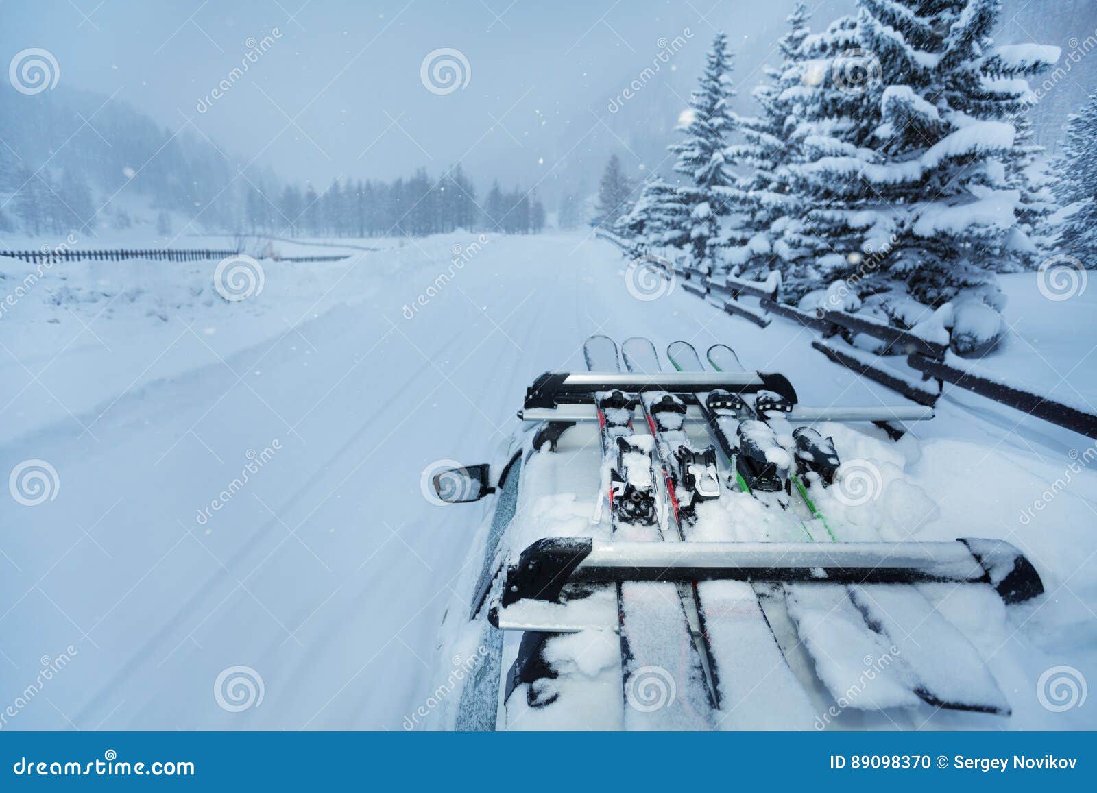 Ski Trip with Skis on the Car Roof during Snowfall Stock Photo - Image ...