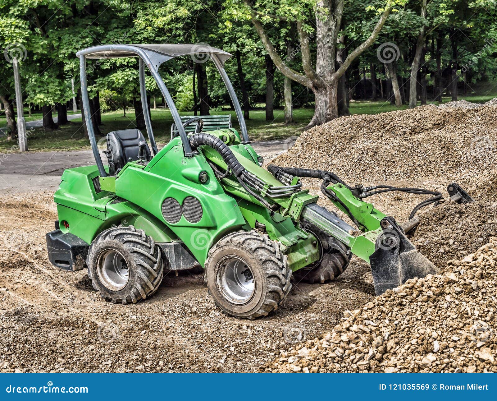 Skid Loader with Loaded Gravel Stock Image - Image of facility, loader ...