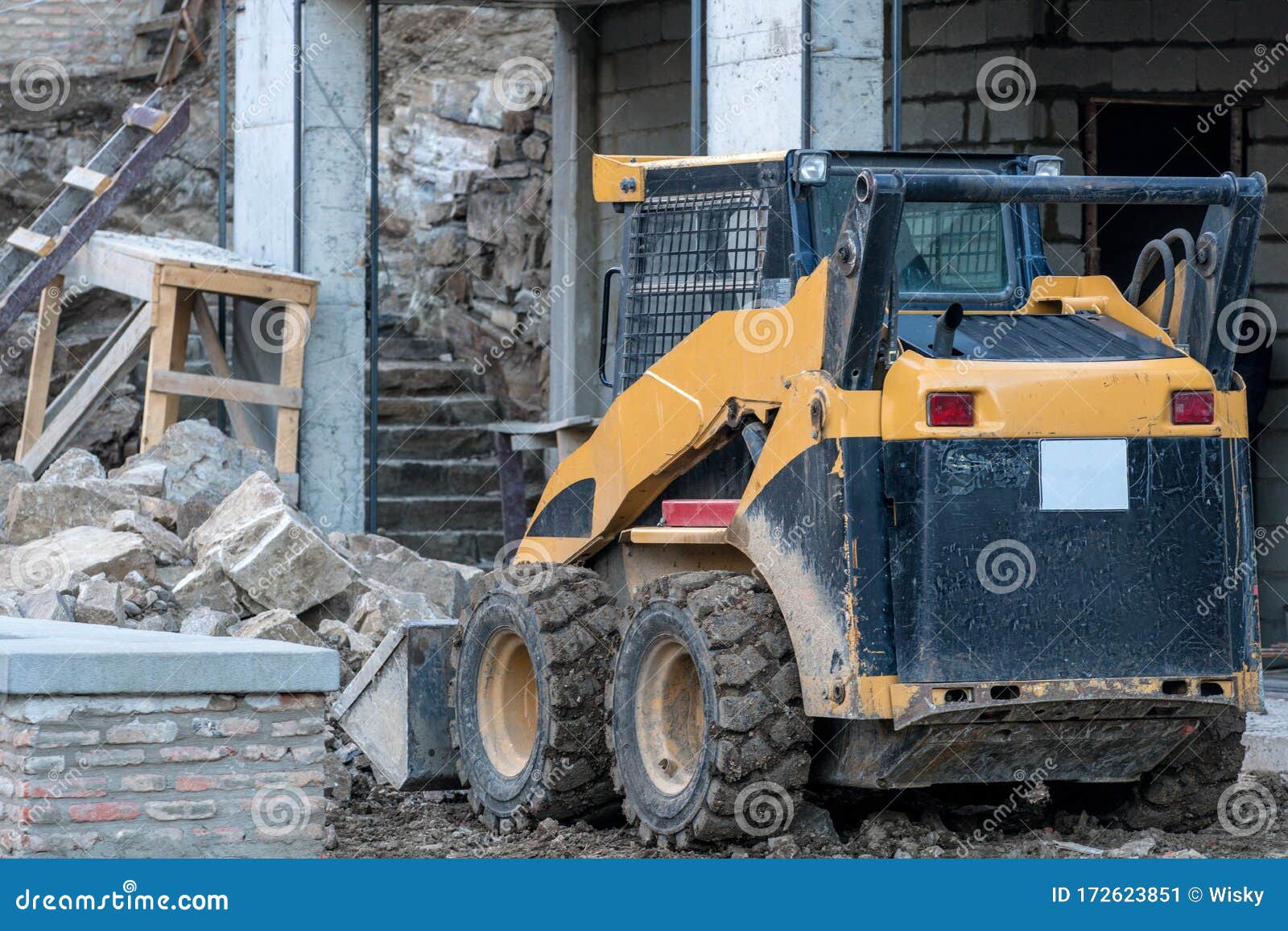 Skid Loader Working on Building Construction Stock Image - Image of ...