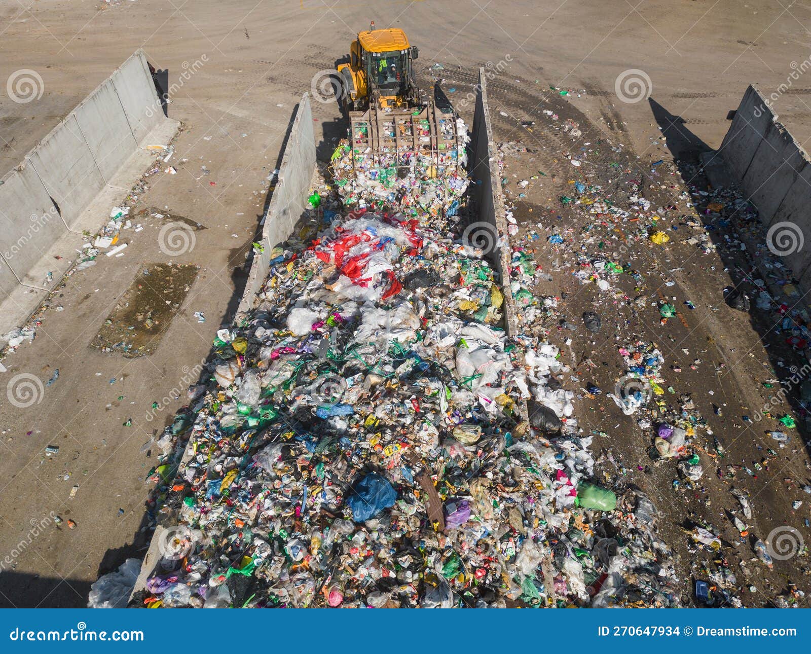Skid Steer Loader Moving Garbage at the Landfill Site, Drone Shot Stock ...
