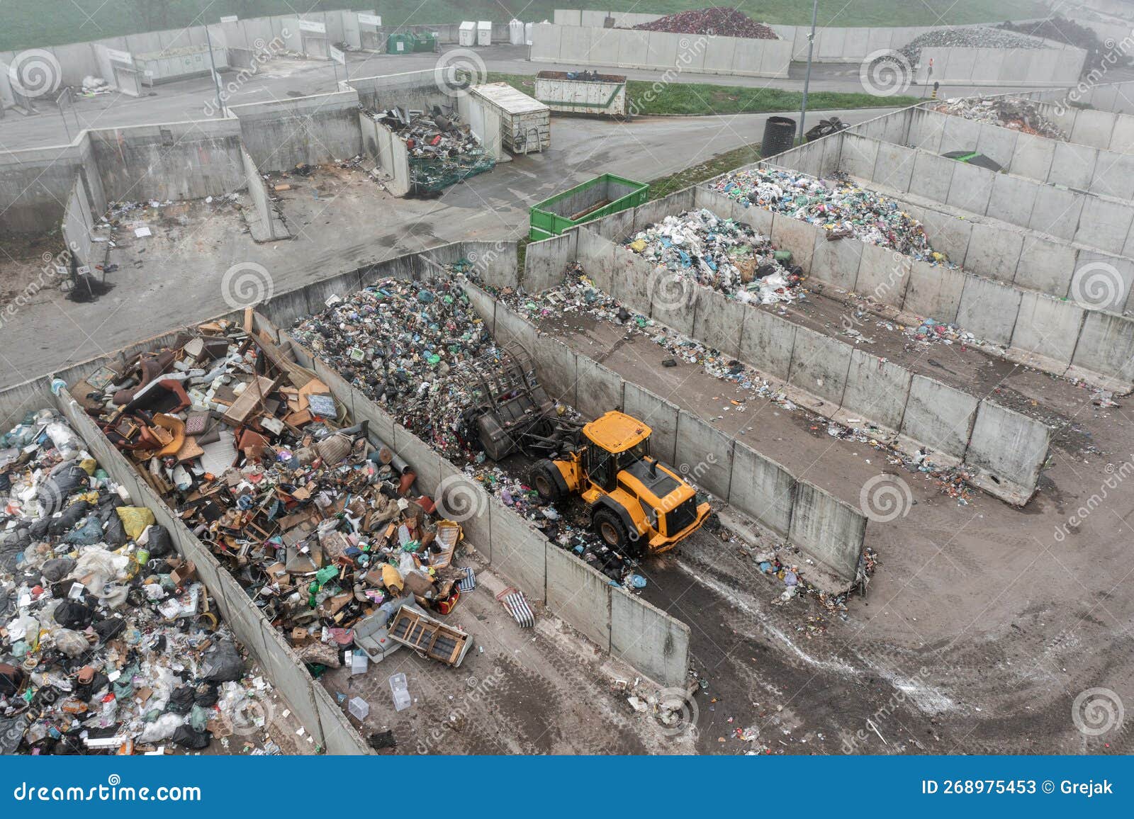 Skid Steer Loader Moving Garbage at the Landfill Site Stock Image ...
